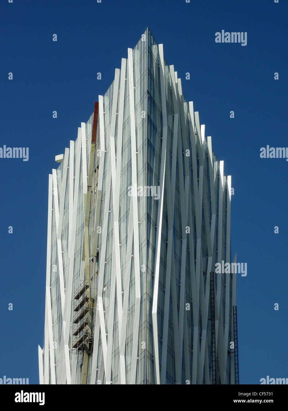 Top of a white skyscraper by beautiful weather Stock Photo - Alamy