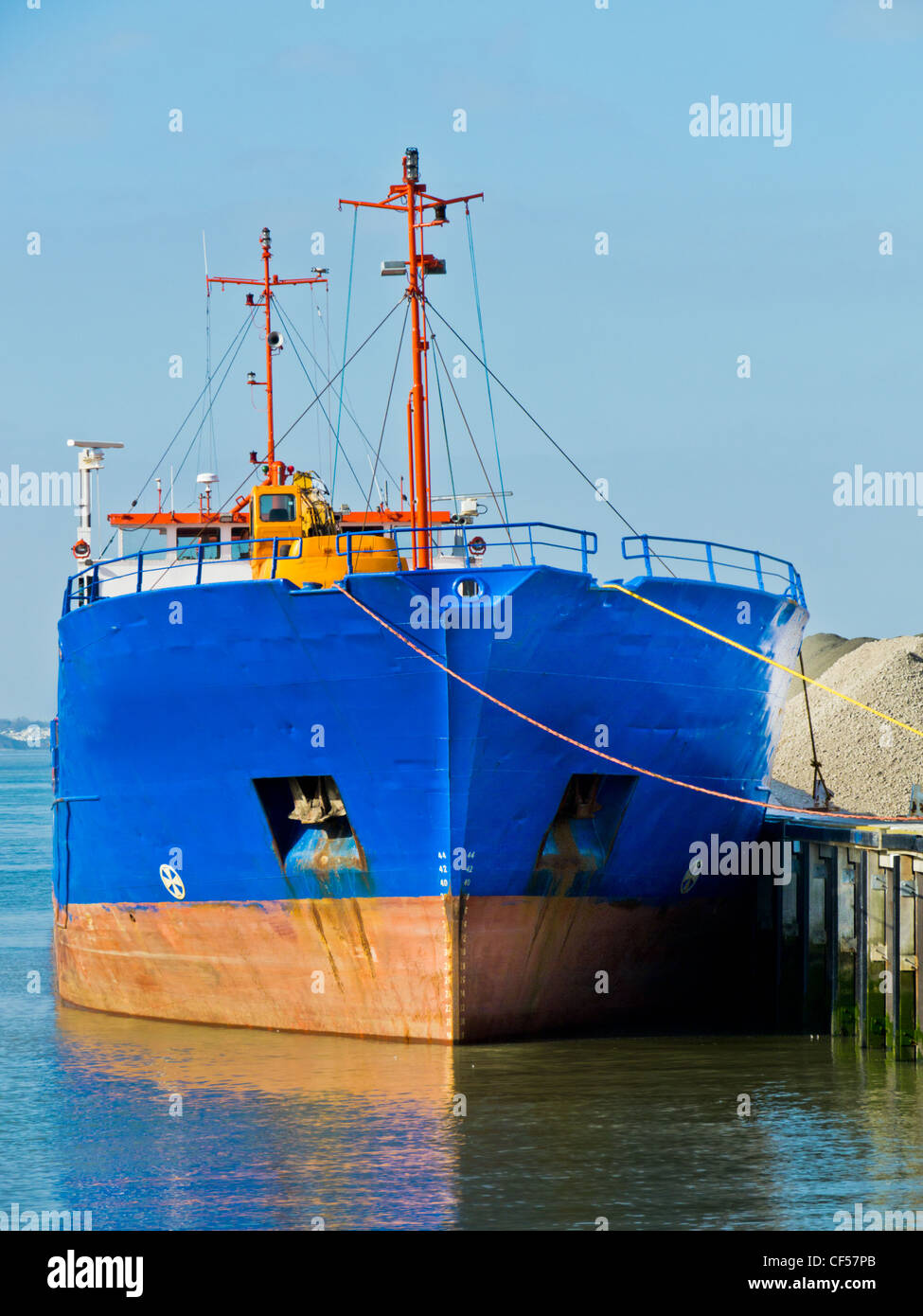 Large cargo vessel moored in a harbor Stock Photo - Alamy
