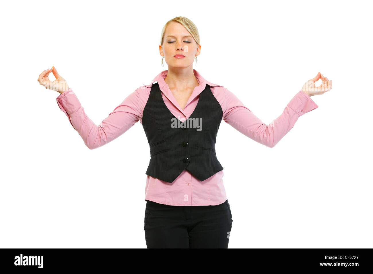 Woman employee meditating Stock Photo - Alamy