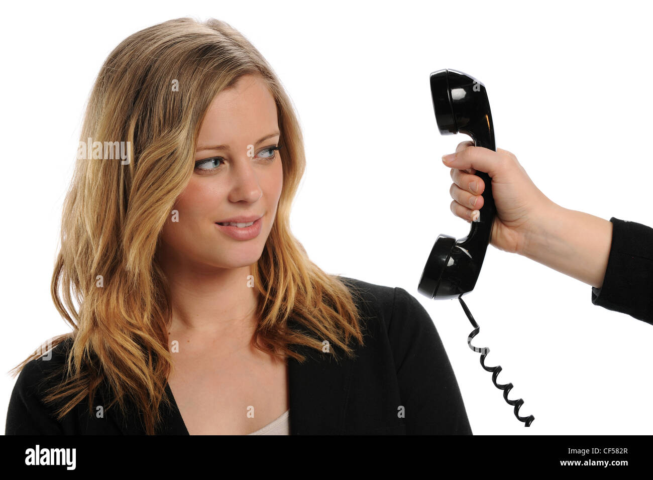 Businesswoman refusing to answer the phone isolated on a white ...