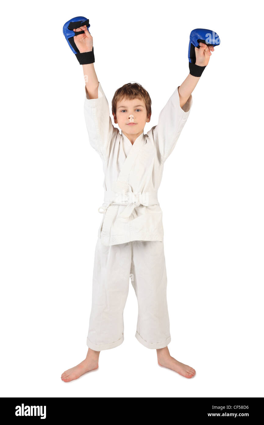 little boxer boy in white dress and blue boxing gloves hands up looking ...