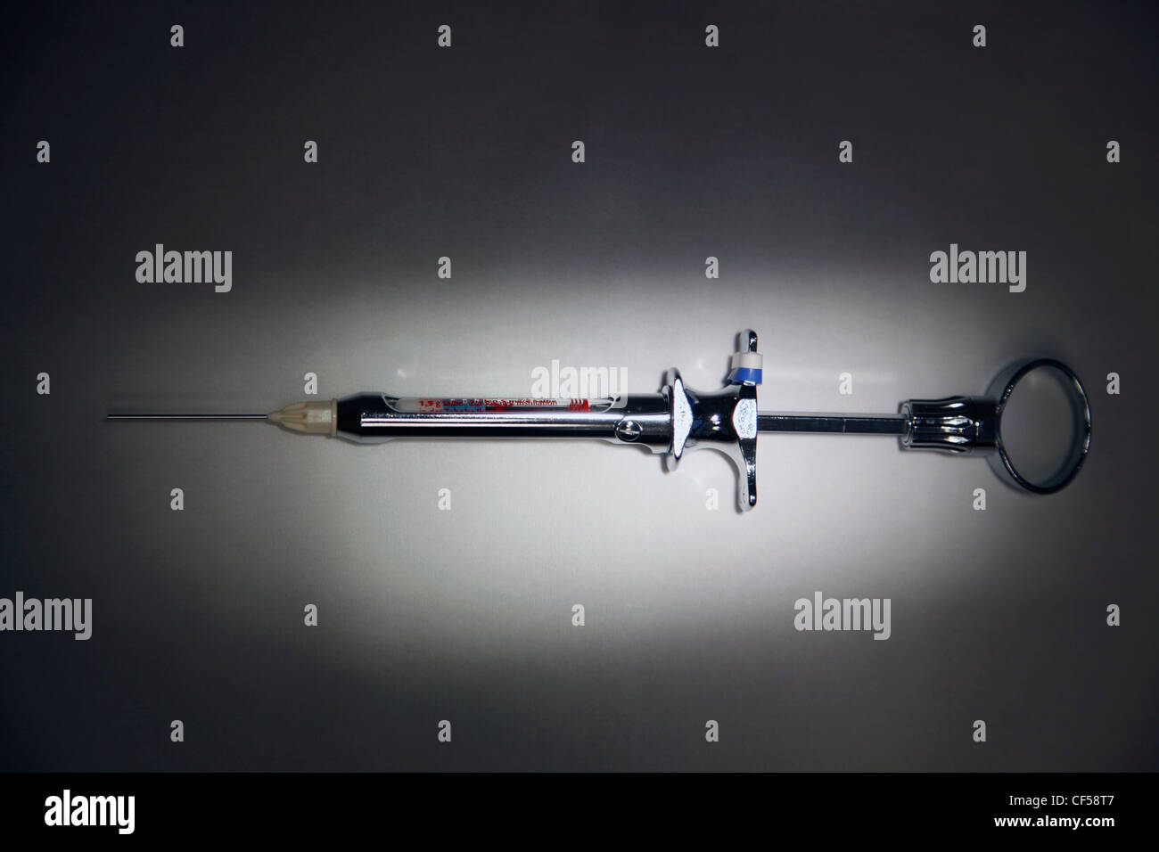 Syringe on white background Stock Photo - Alamy