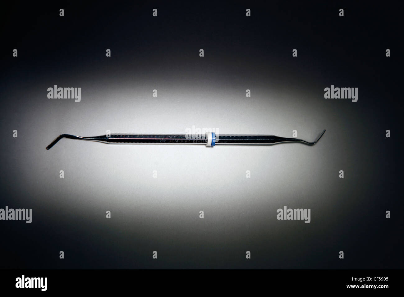 Dental spatula on white background Stock Photo - Alamy