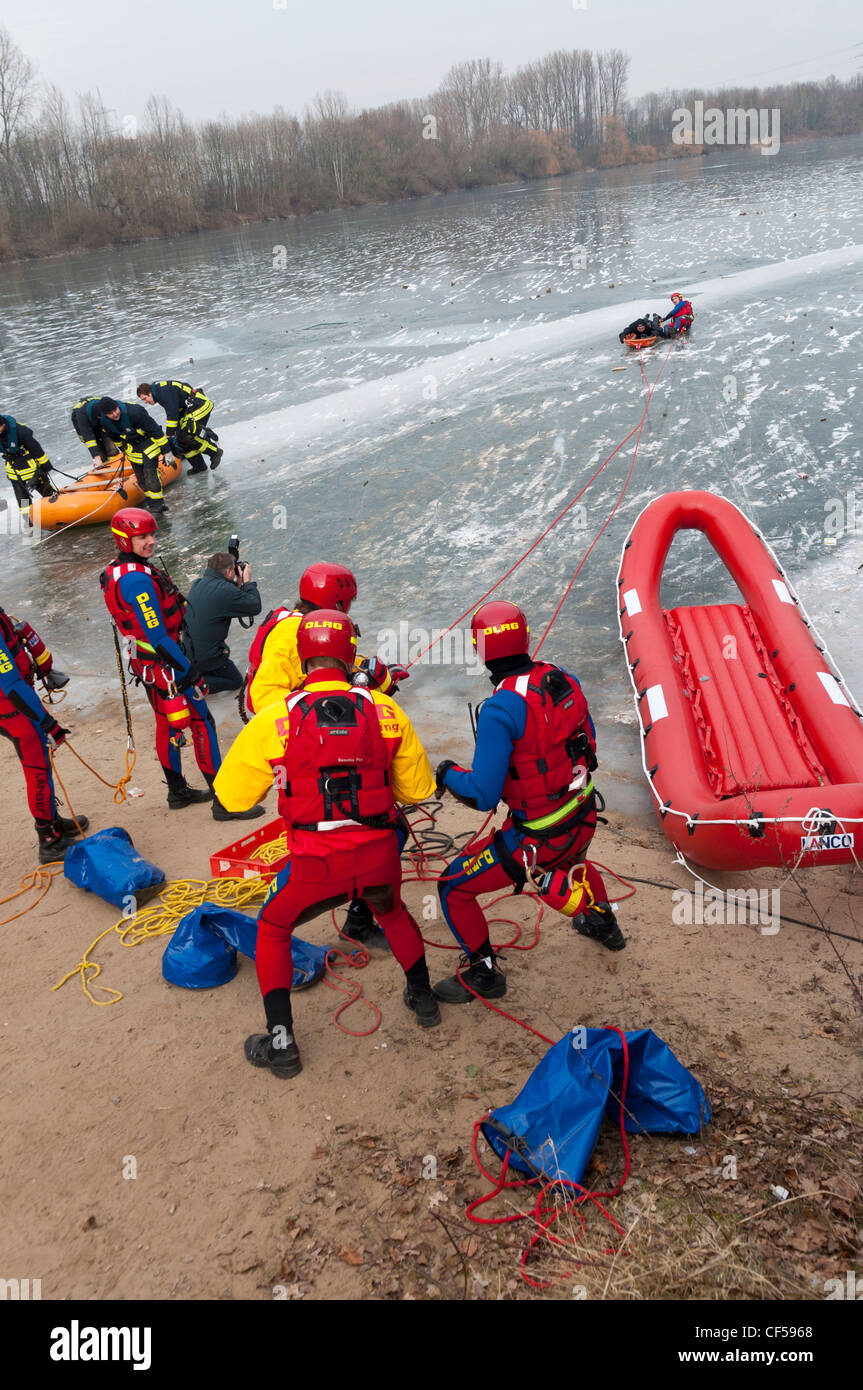 Life saving practice on frozen lake in Germany Stock Photo - Alamy