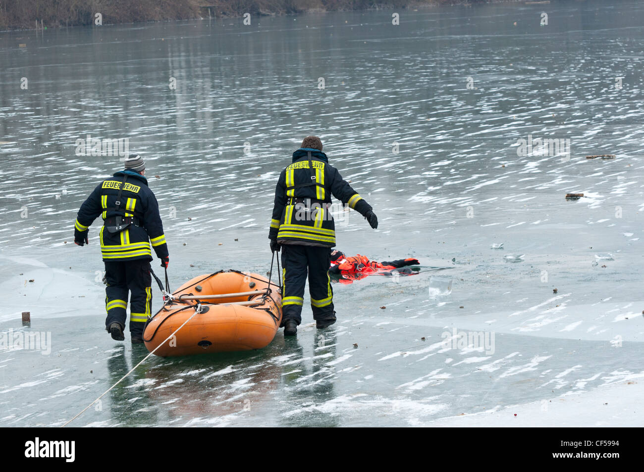 Life saving practice on frozen lake in Germany Stock Photo - Alamy