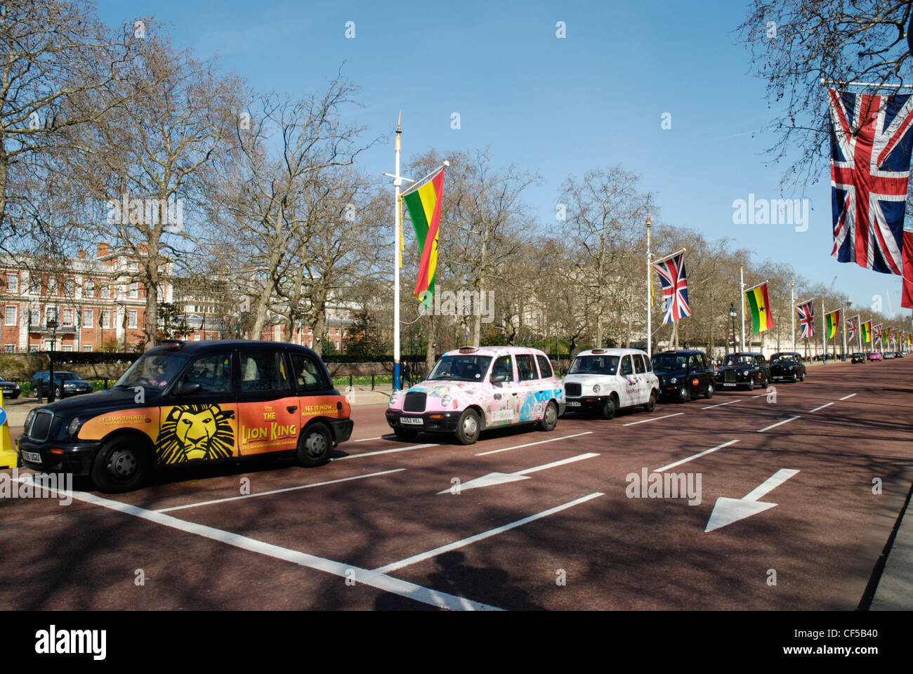 Taxi cabs at the Mall lined with Union Jack and European Union flags ...