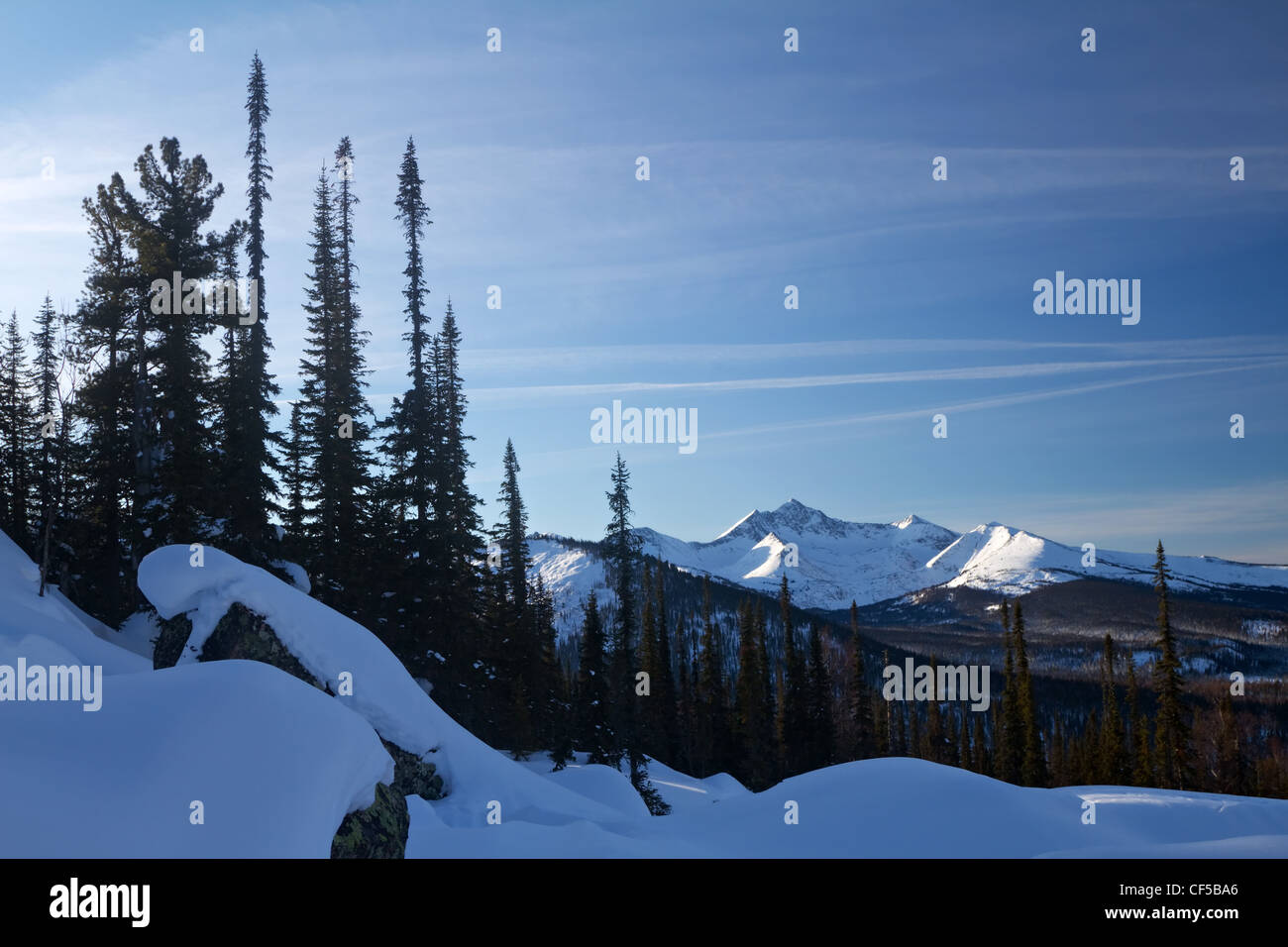 Snow rocks and taiga forest in Siberia mountains. Kuznetskiy Alatau ...
