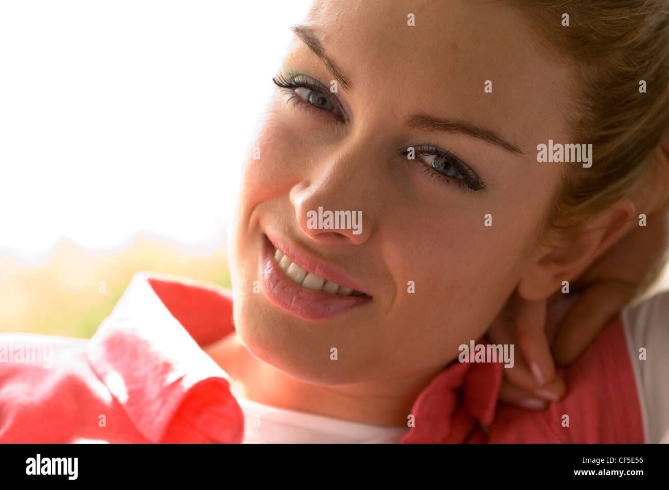 Female smiling to camera Stock Photo - Alamy