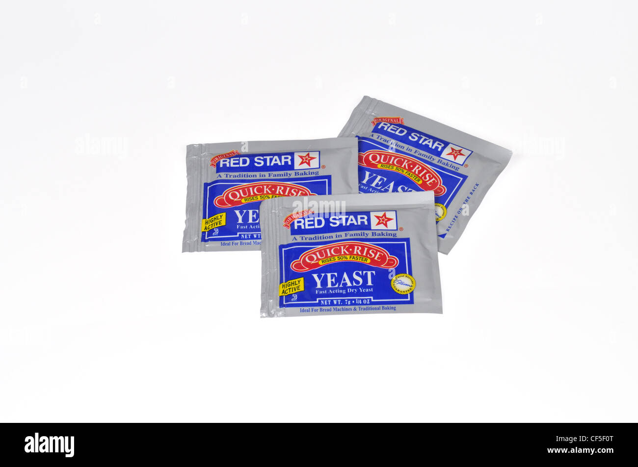 Packets of quick rising yeast for baking on white background cut out ...