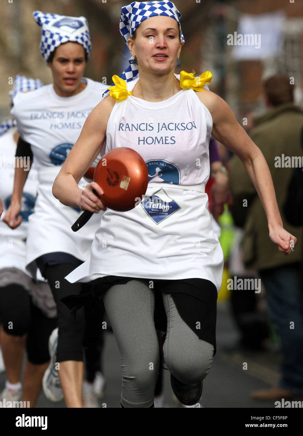 COMPETITORS IN THE WORLDS OLDEST PANCAKE RACE IN OLNEY,BUCKS ON FEB 21 ...