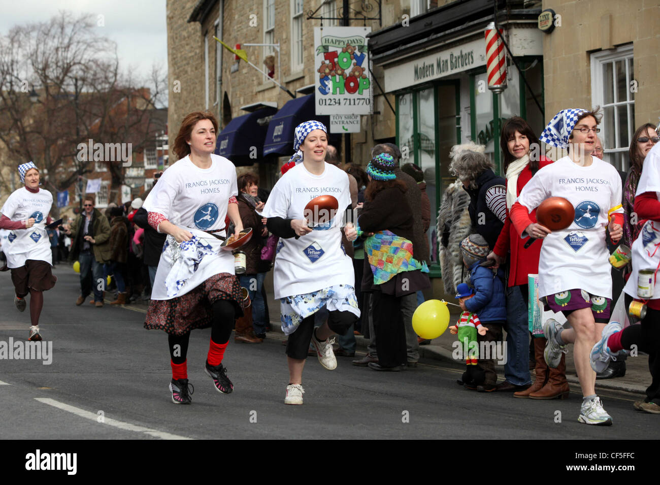 COMPETITORS IN THE WORLDS OLDEST PANCAKE RACE IN OLNEY,BUCKS ON FEB 21 ...