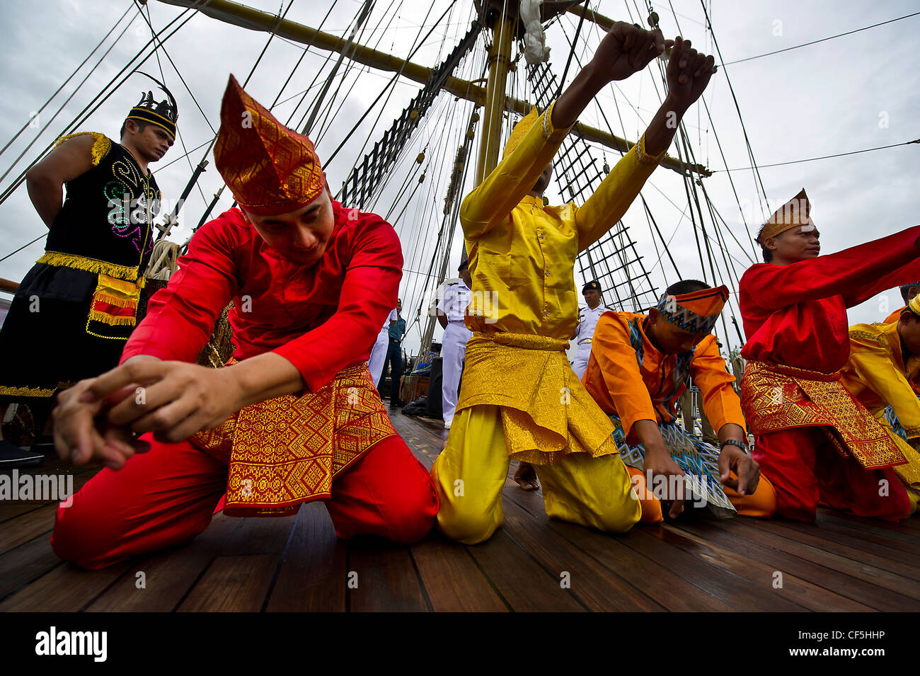Indonesian sailors perform a traditional dance to welcome U.S. Military ...