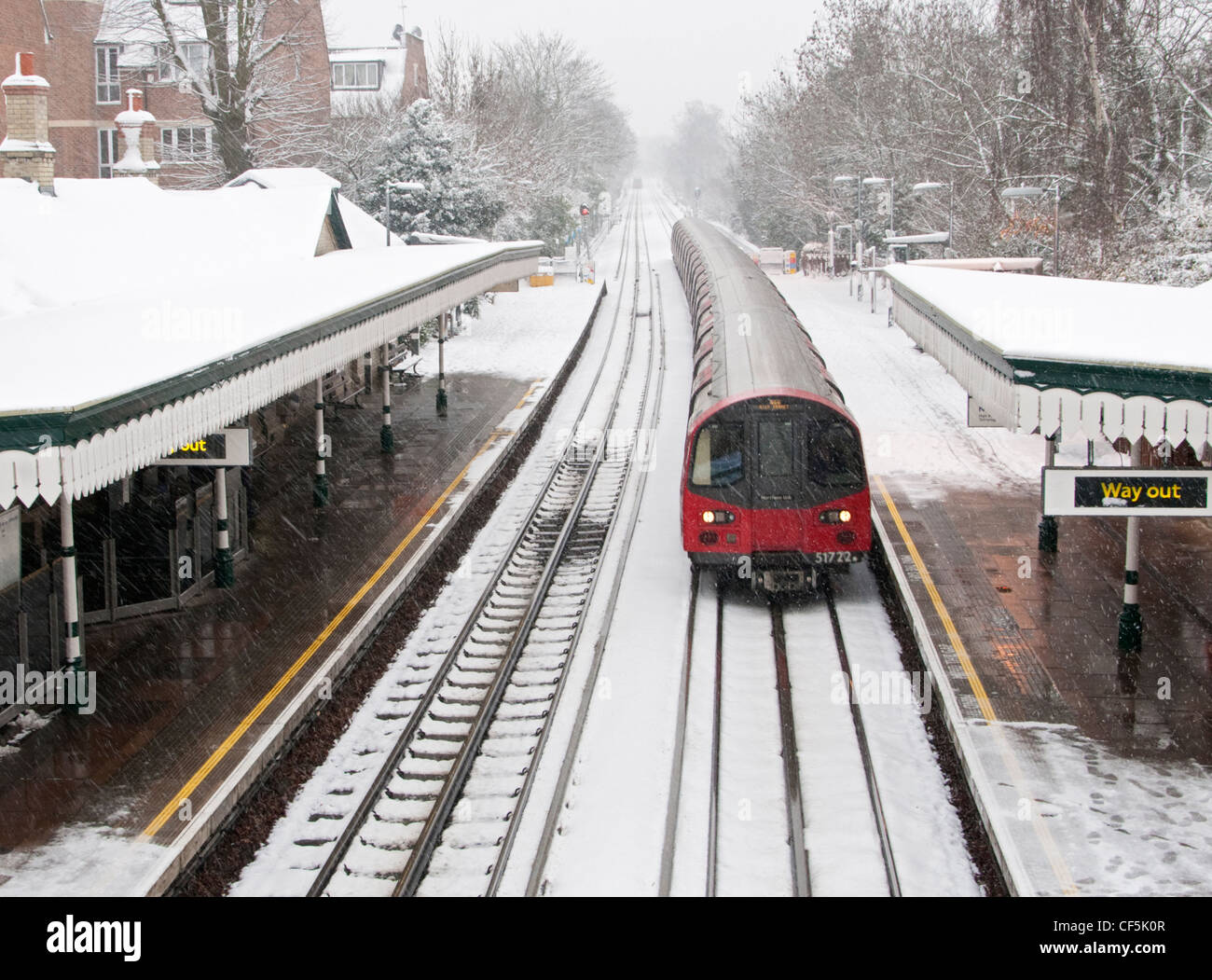 A Northern Line tube train arriving at Woodside Park Station during ...