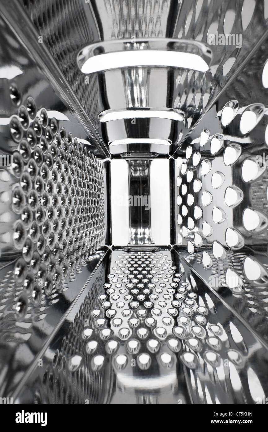 close up of metal food cheese grater stainless steel highly reflective ...