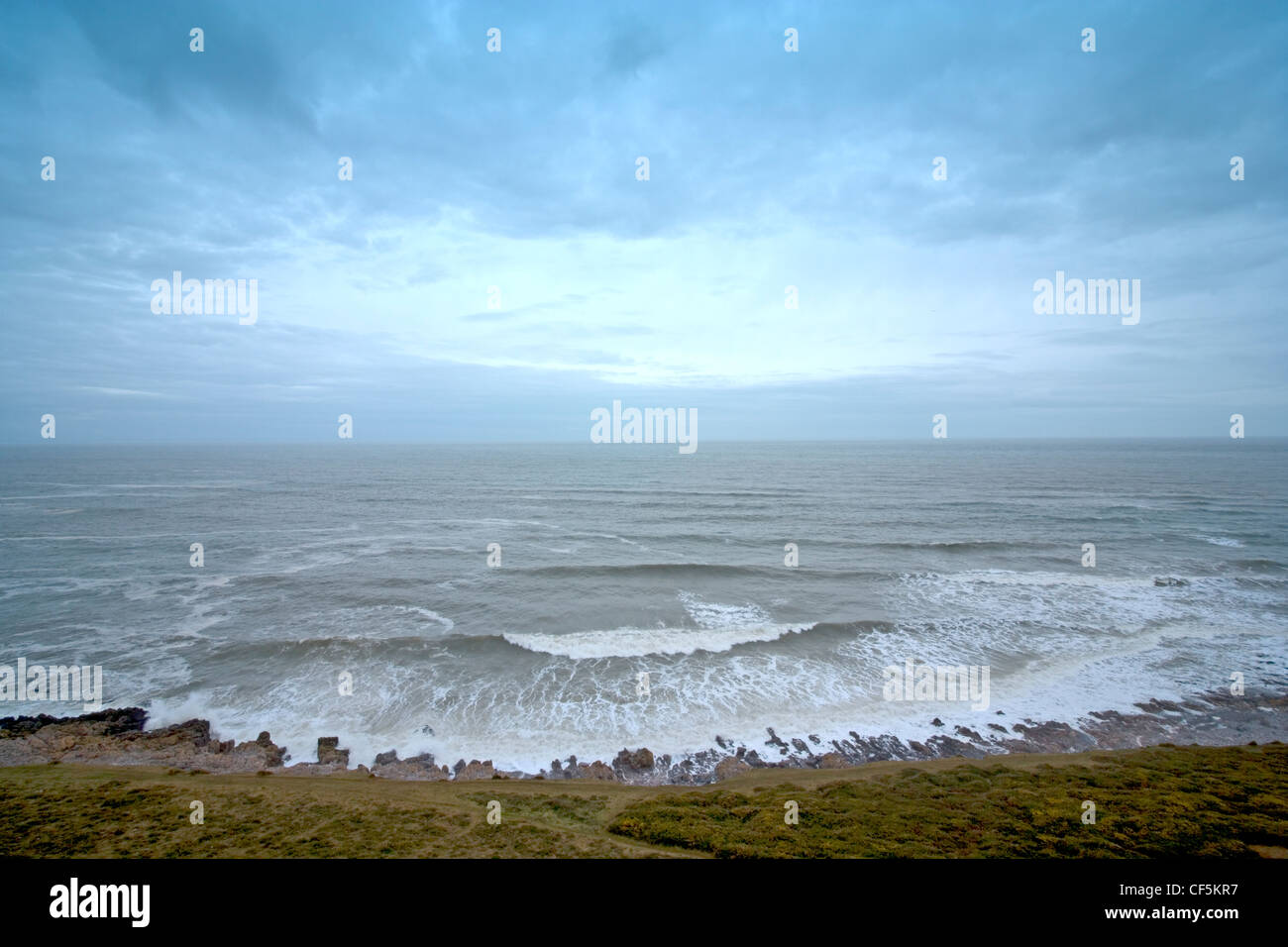 Worms head at Gower Peninsula. The worms head, stretches out to sea and ...