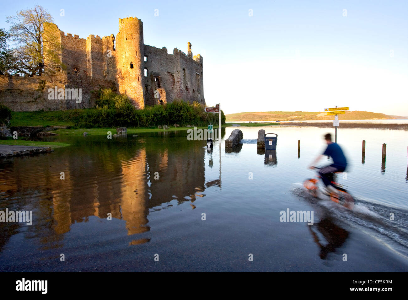 The river Taf flooding at Laugharne Castle. The castle stands on a low ...