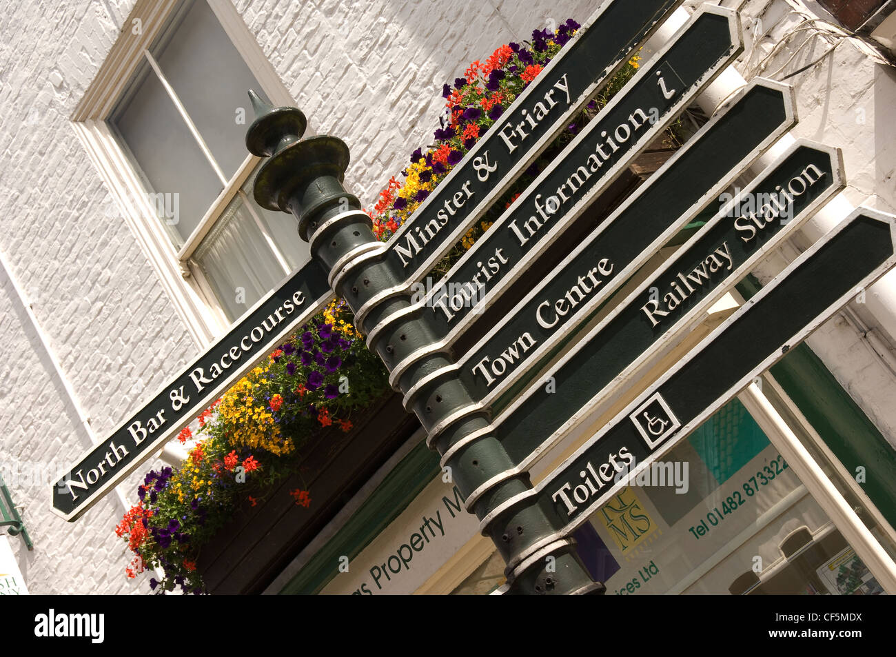Tourist information sign post Stock Photo - Alamy