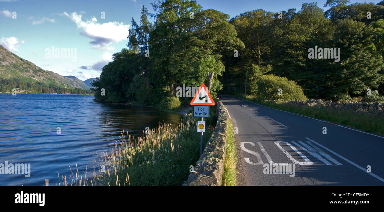 A view of Ullswater and the A592 running beside it Stock Photo - Alamy
