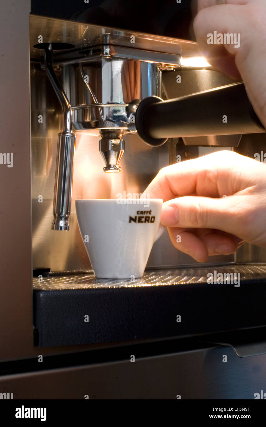 An espresso coffee being made at Cafe Nero Stock Photo - Alamy