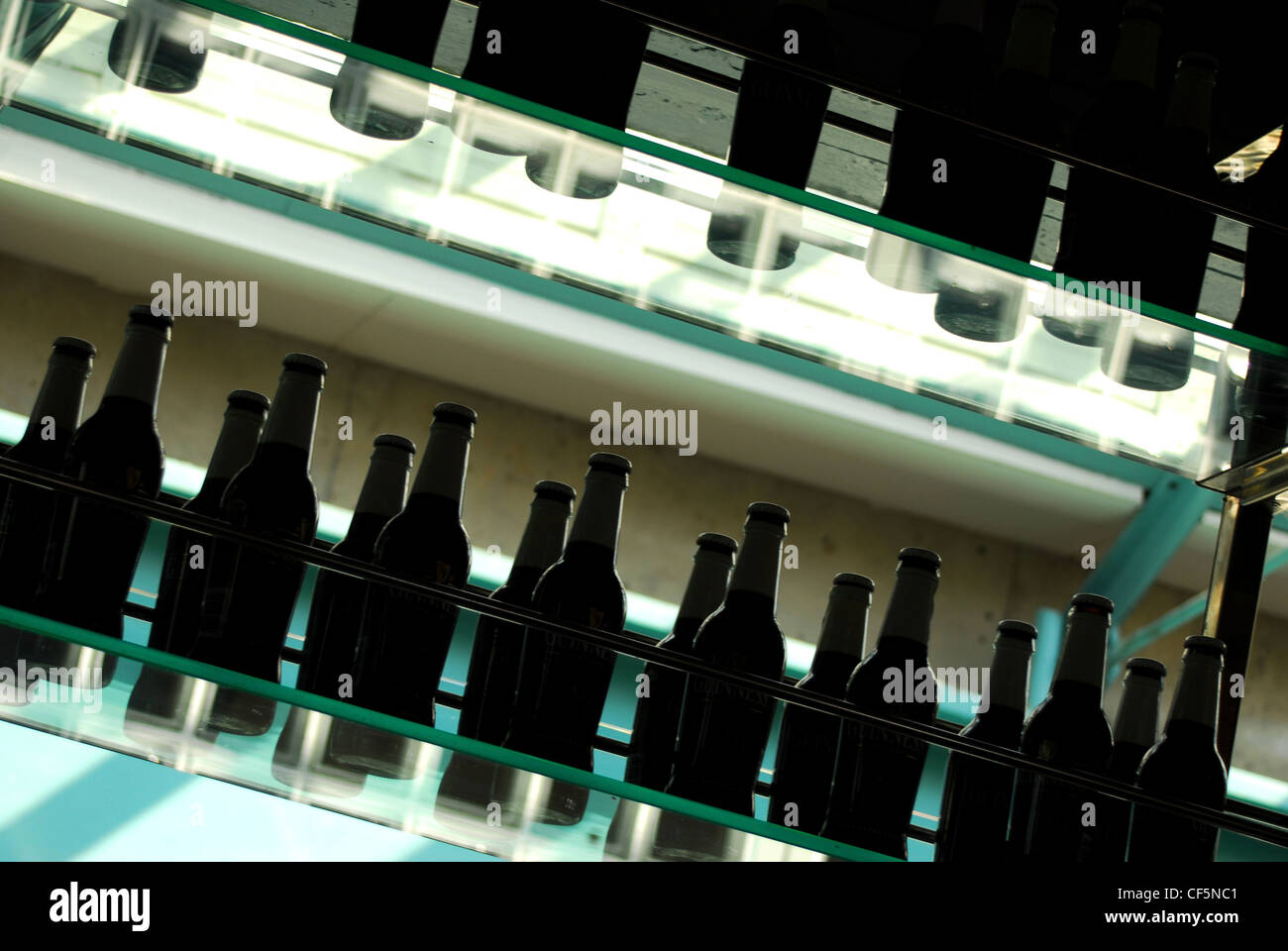 Bottles on display at the Guinness Storehouse in Dublin Stock Photo - Alamy