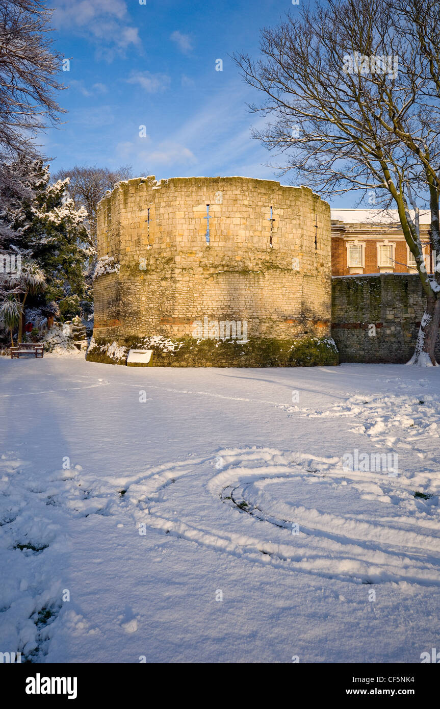 The snow covered Roman-built Multangular Tower in the Yorkshire Museum ...