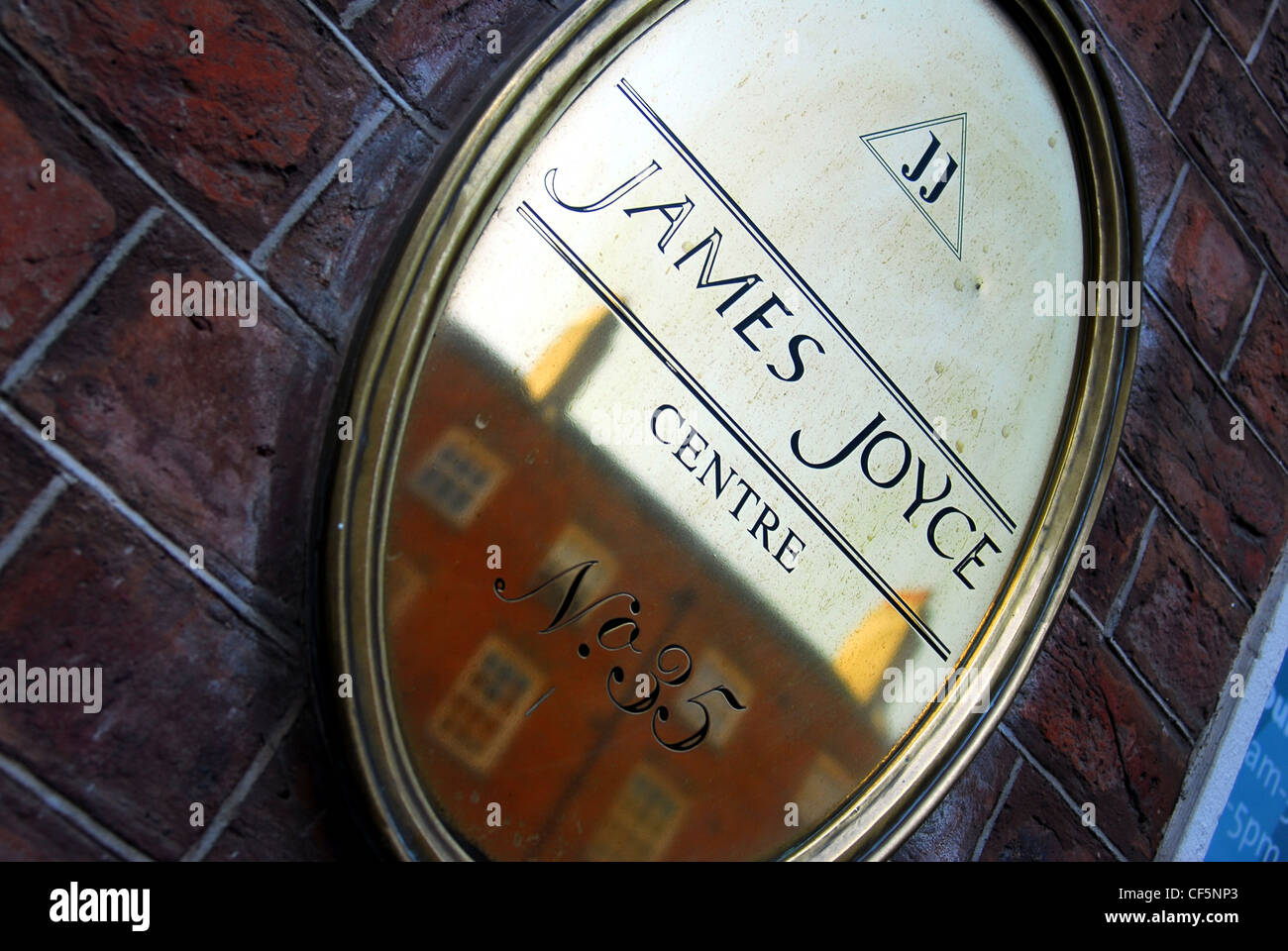 Reflections in a sign at the entrance to the James Joyce centre in ...