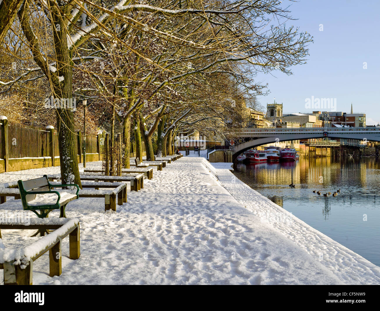 Riverside walk covered in snow along the River Ouse looking towards ...