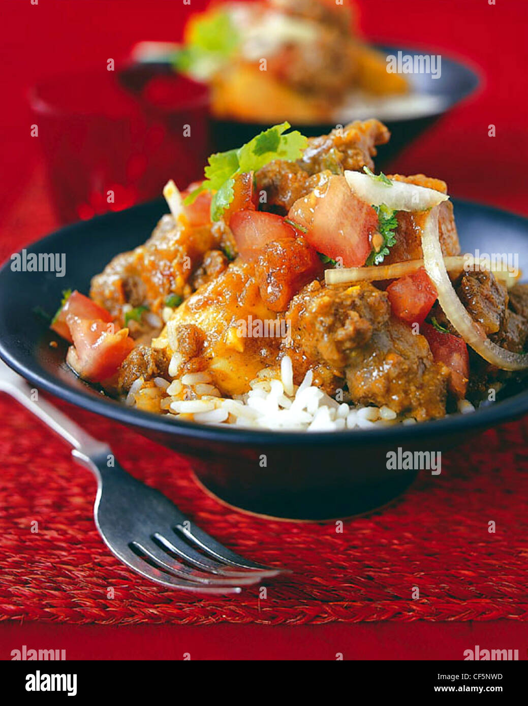 Sausage Curry Chunks of beef sausages tomatoes, baby potatoes, onion ...