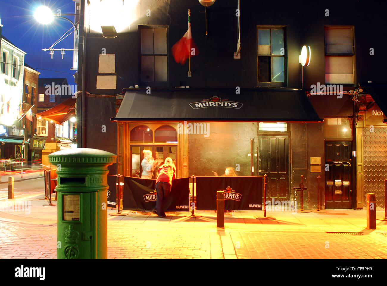 A night time street scene in central Cork Stock Photo - Alamy