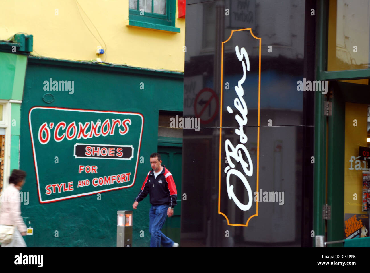 Shop signs from a street scene in central Cork Stock Photo - Alamy