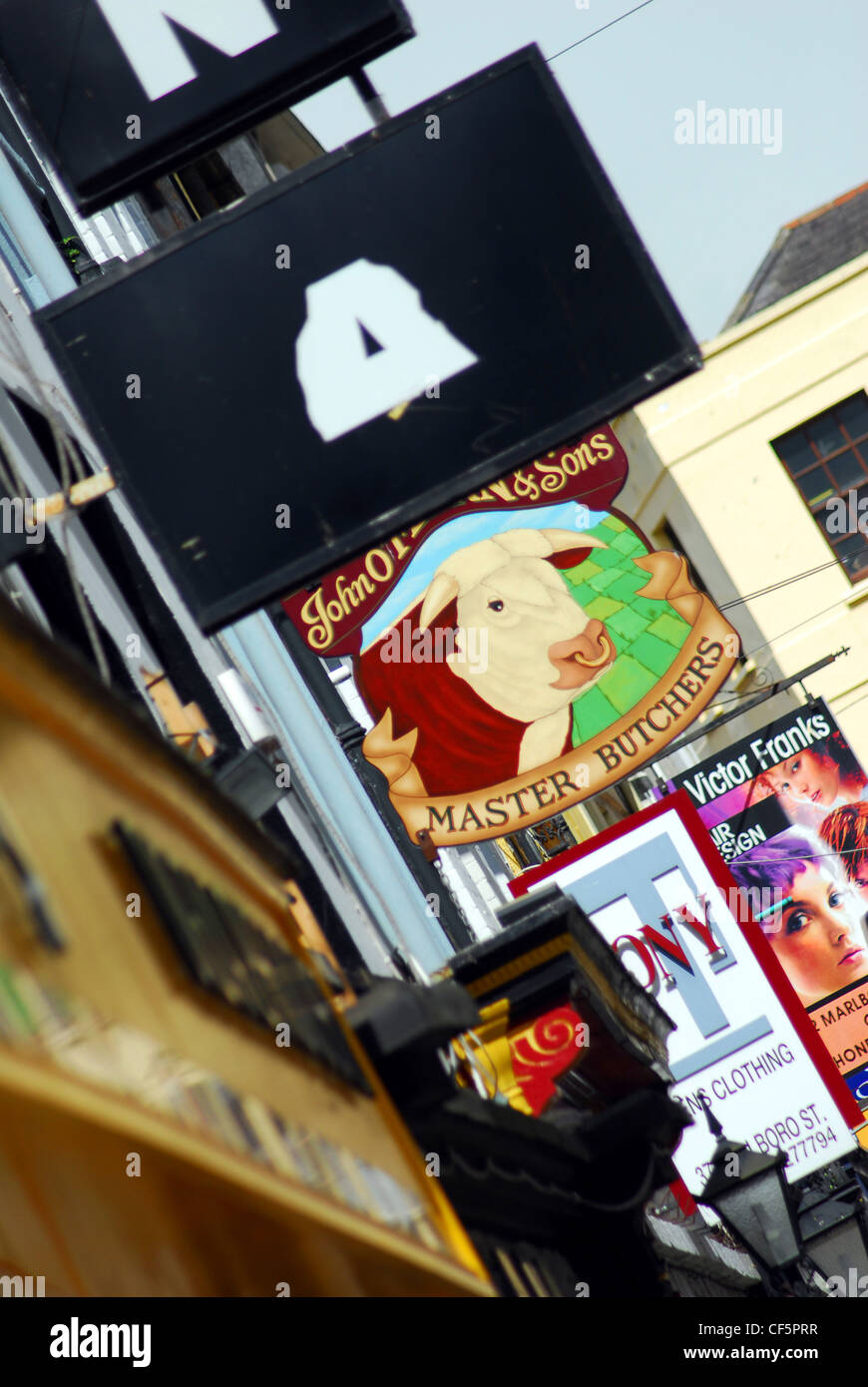 A row of various street signs in central Cork Stock Photo - Alamy