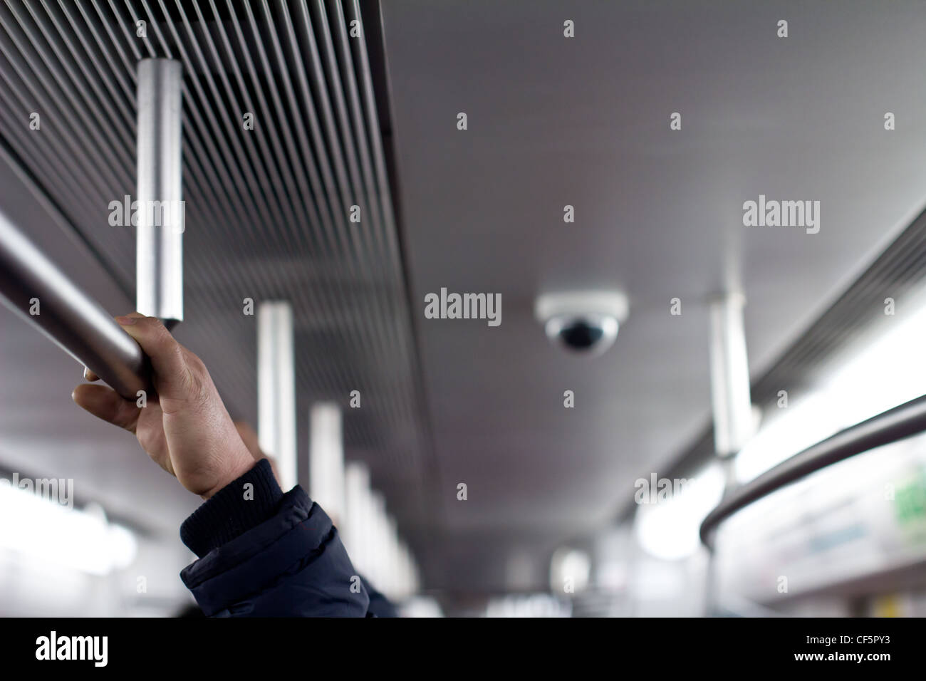 a hand catch the bar in subway of Beijing Stock Photo - Alamy