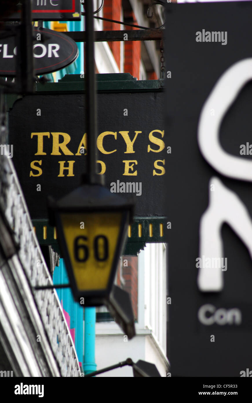 A row of various street signs in central Cork Stock Photo - Alamy