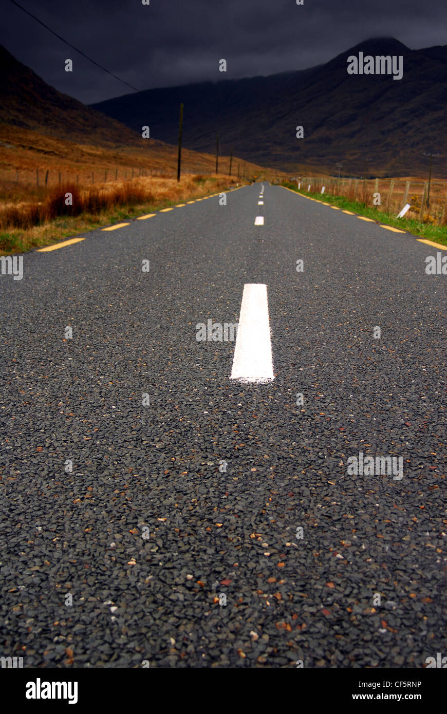 Road running through the Partry Mountains in County Mayo Stock Photo ...