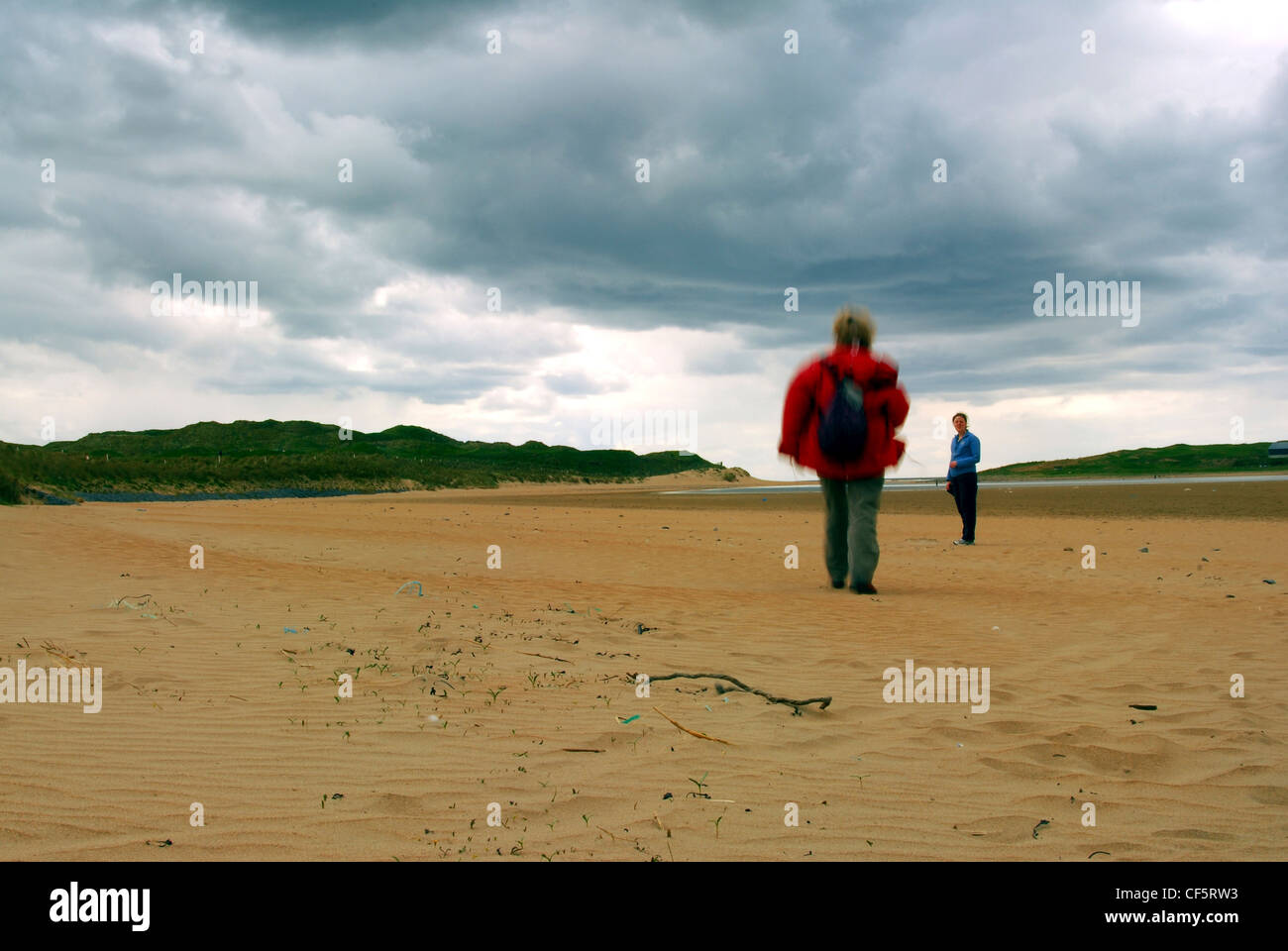 People walking on the beach at Liscannor in County Clare Stock Photo ...