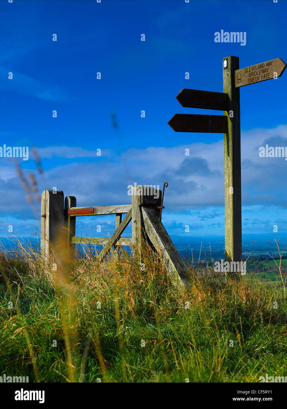 Signpost and gate on the Cleveland Way near Sutton Bank in the North ...