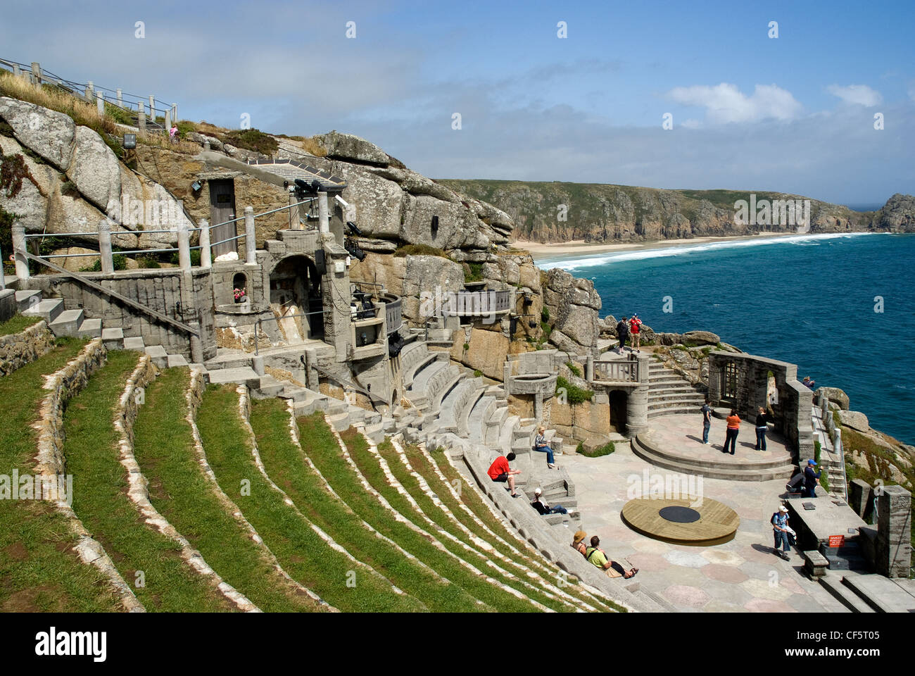 A view over seating at the Minack Theatre towards Porthcurno Bay in the ...