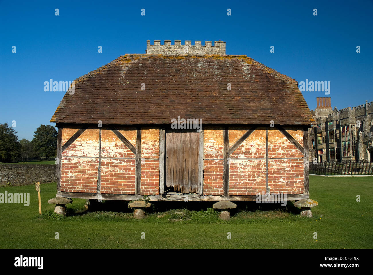 A Tudor barn in the grounds of Cowdray Ruins, one of Southern England's ...