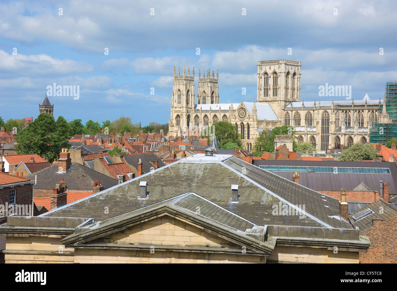 View across roof tops towards York Minster. The Minster is the largest ...