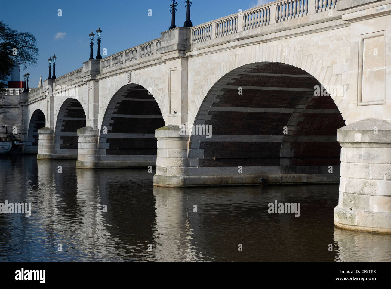 Arches of Kingston Bridge spanning the River Thames Stock Photo - Alamy