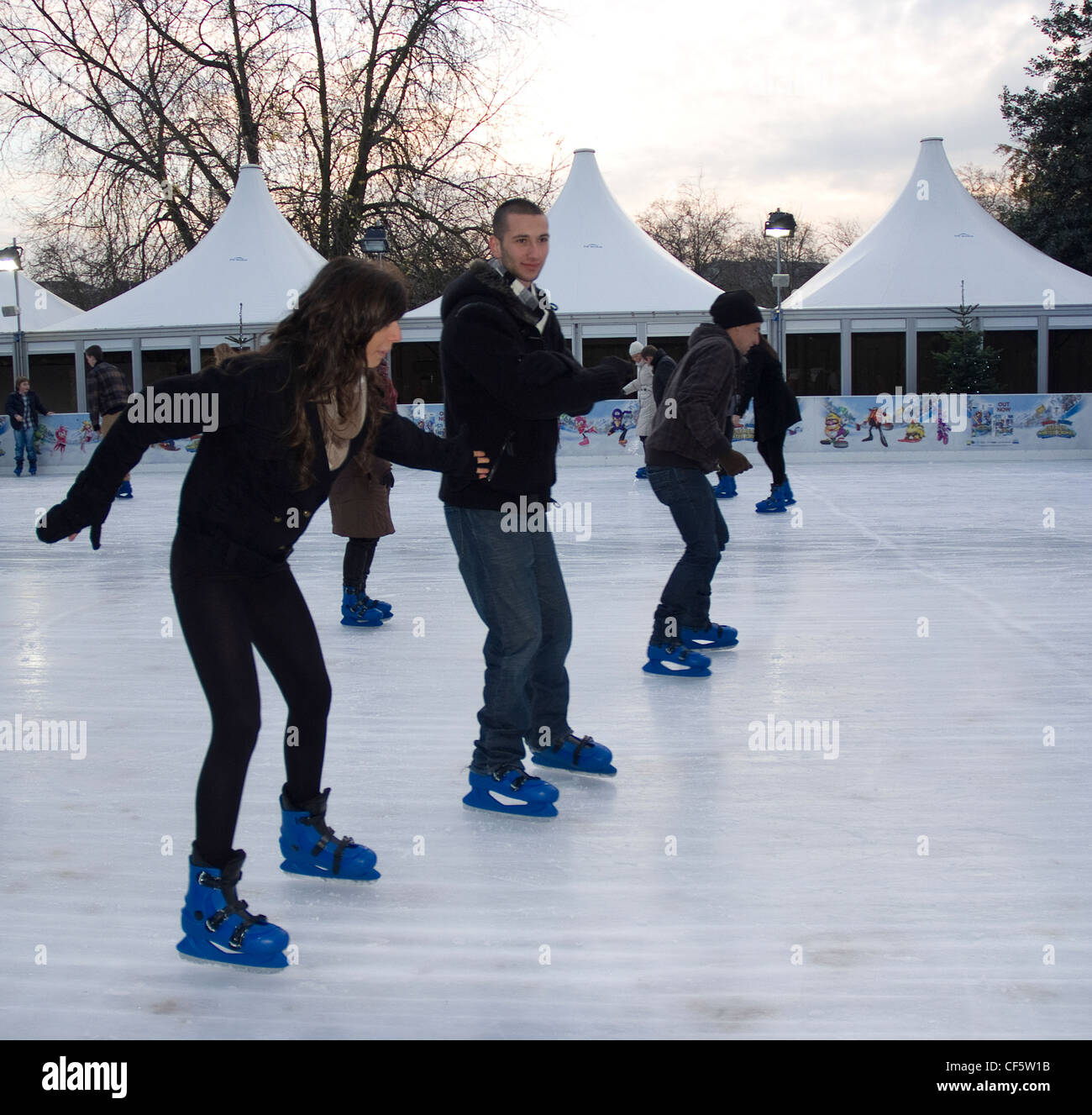 People skating on the ice rink at the Winter Wonderland in Hyde Park ...