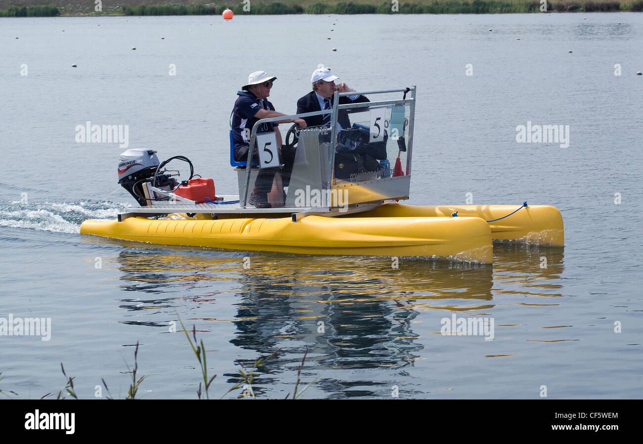 Referees returning to the start after a race at Eton Dorney, the venue ...