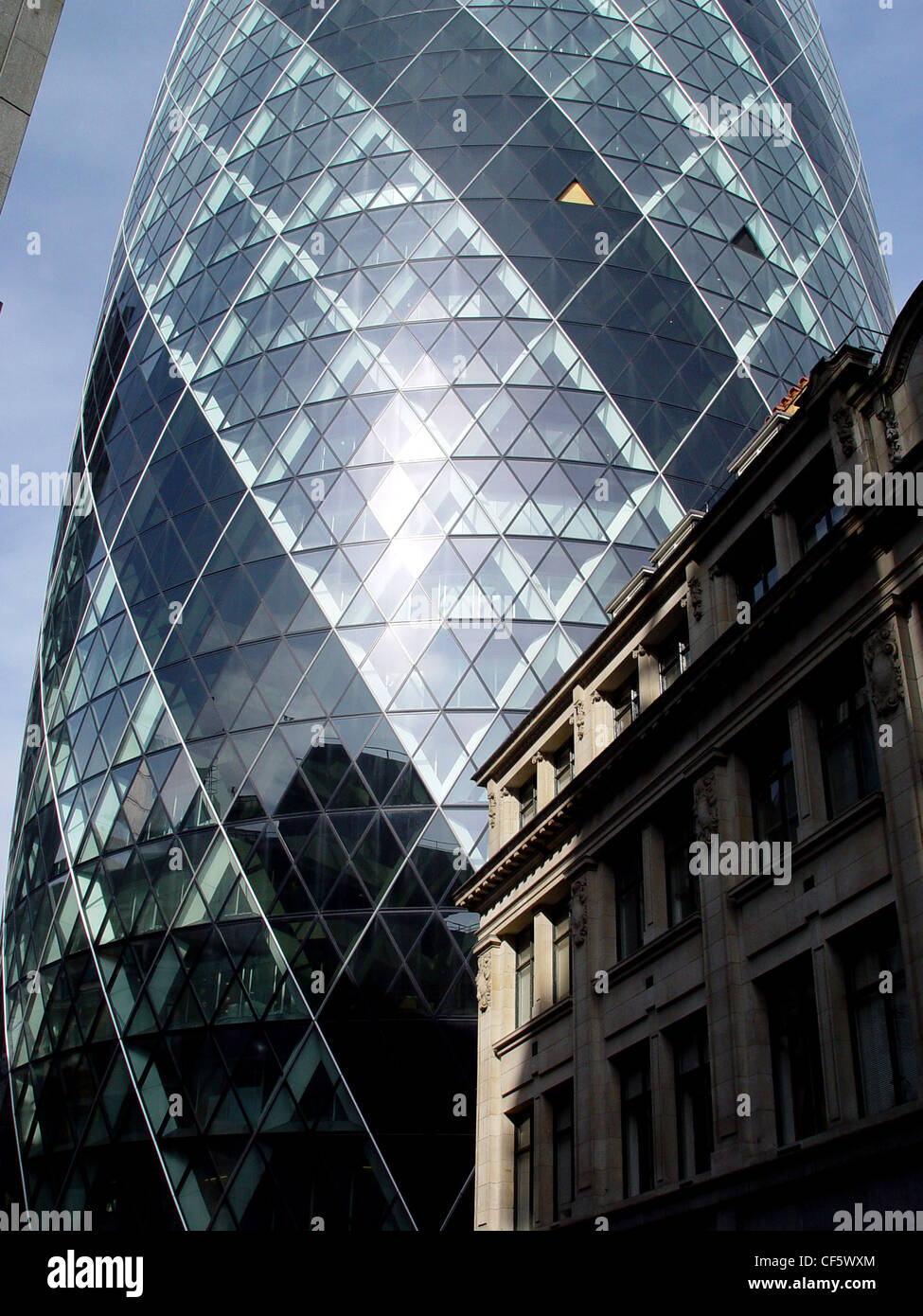 A view up at the Swiss Re building in The City Stock Photo - Alamy