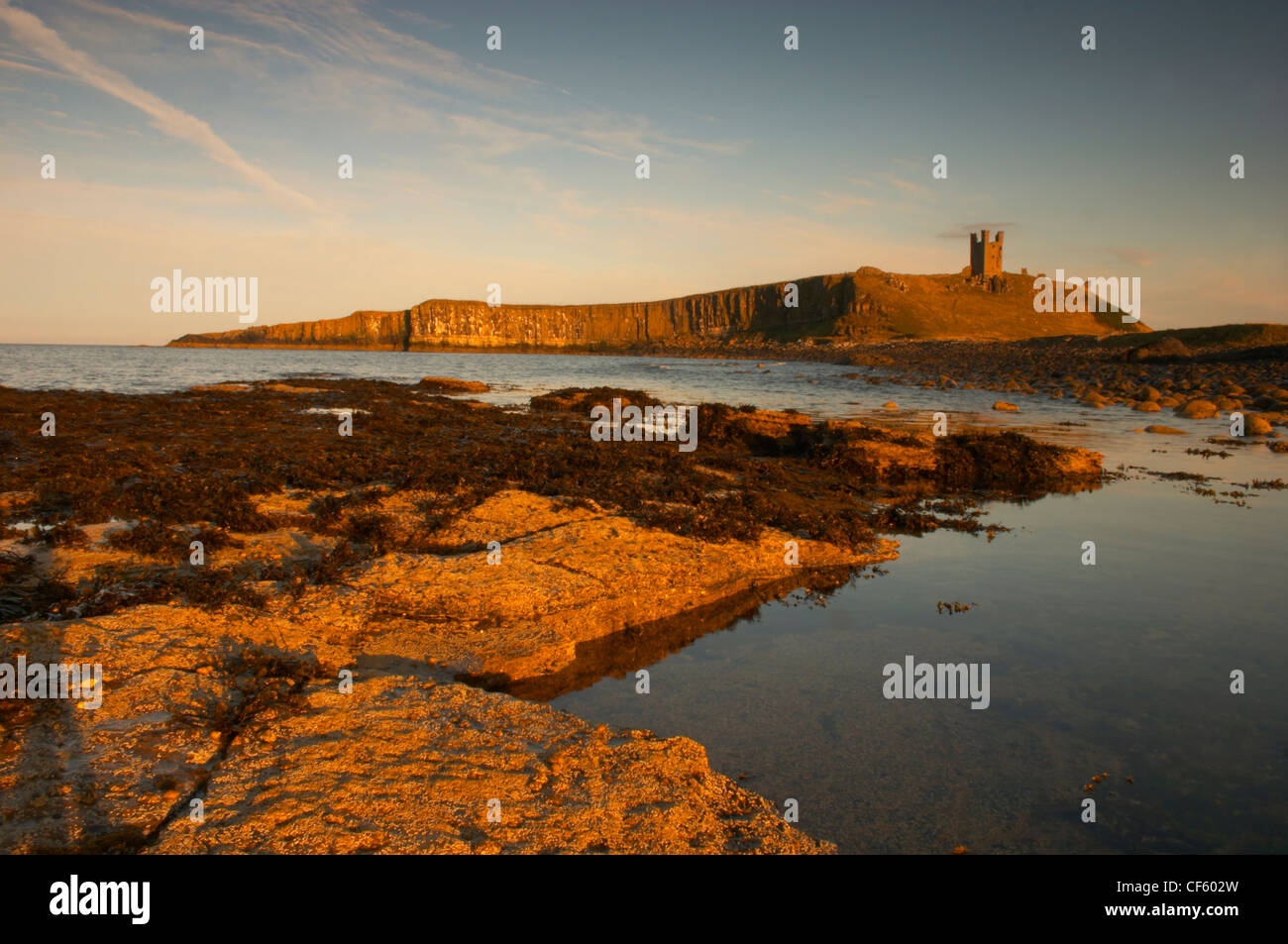 A view of Dunstanburgh Castle from Embleton Bay Stock Photo - Alamy