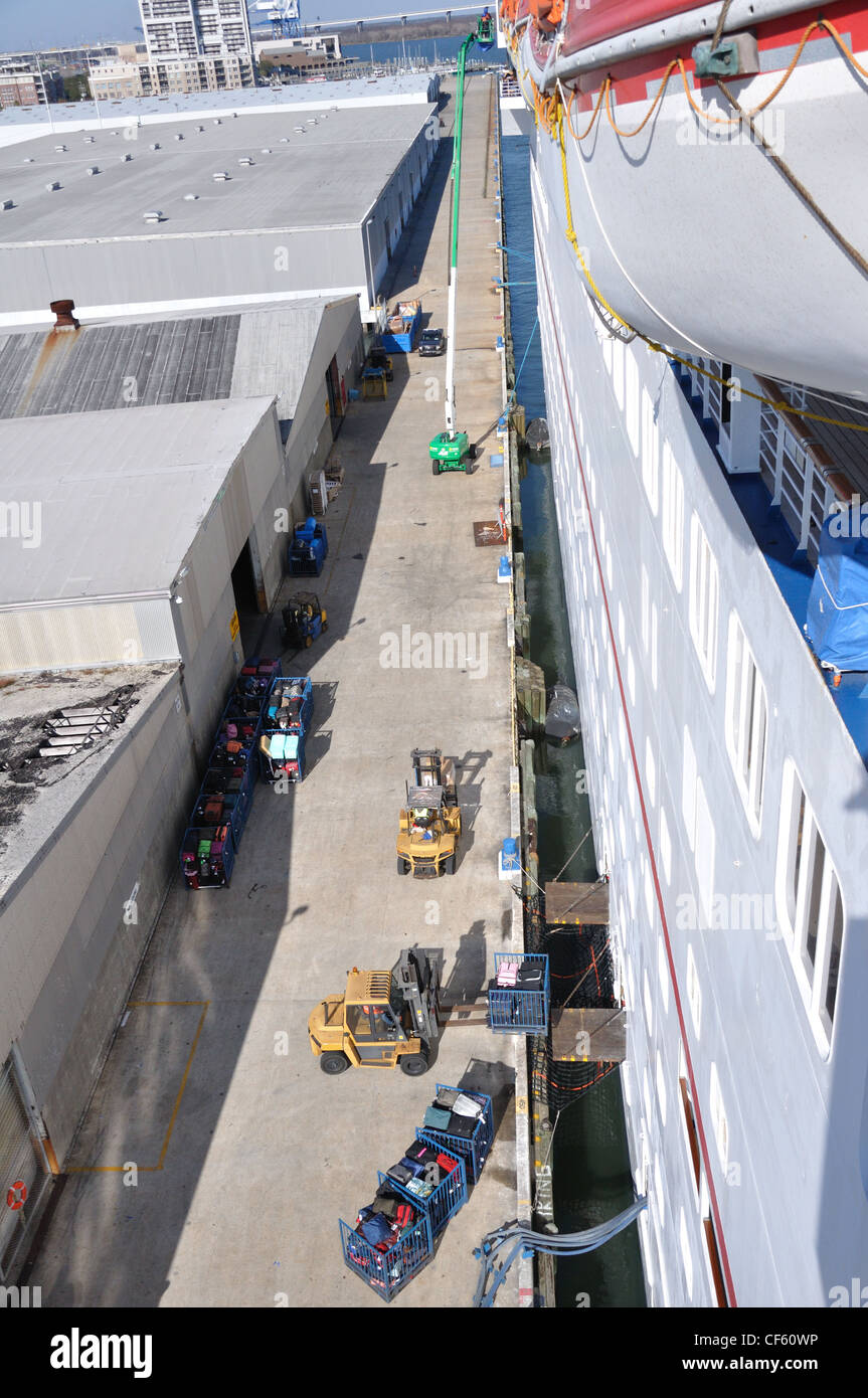 Loading passengers' luggage on cruise ship Stock Photo - Alamy