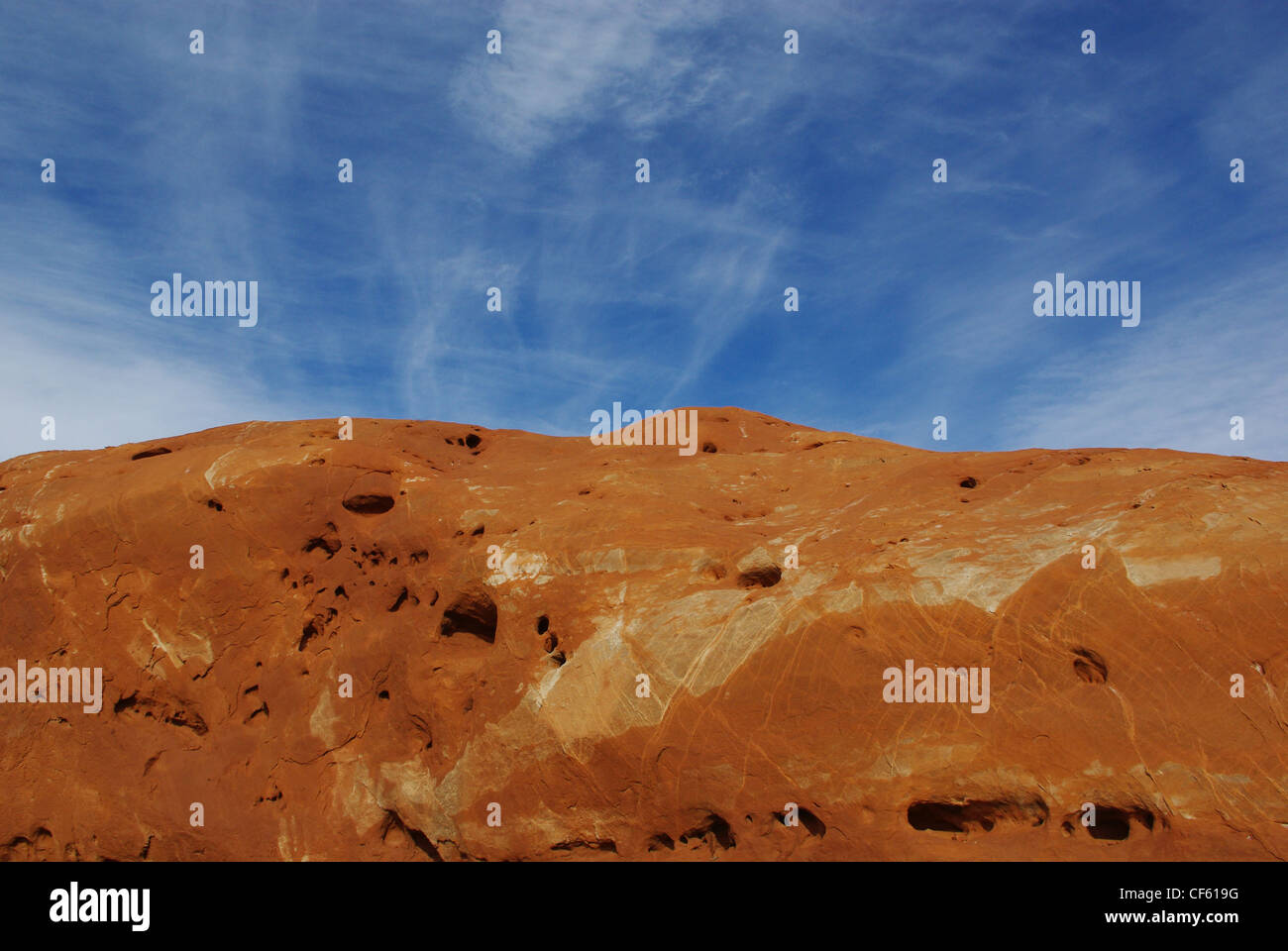 Crossed stripes on red rock and blue sky, Utah Stock Photo - Alamy