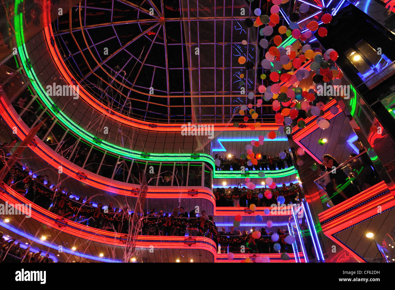 Cruise ship New Year's Eve celebration party in the main lobby hall ...