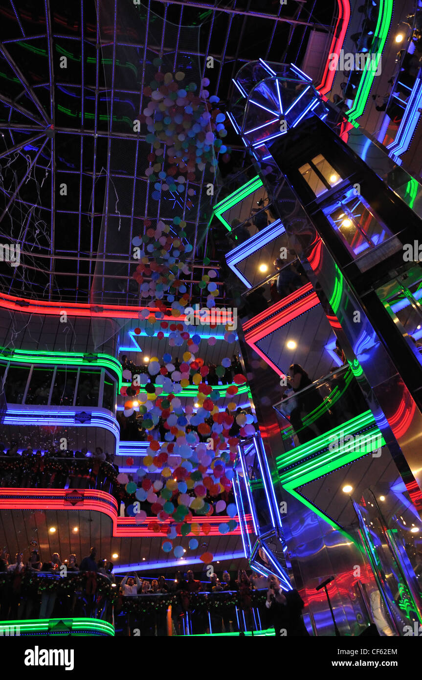 Cruise ship New Year's Eve celebration party in the main lobby hall ...