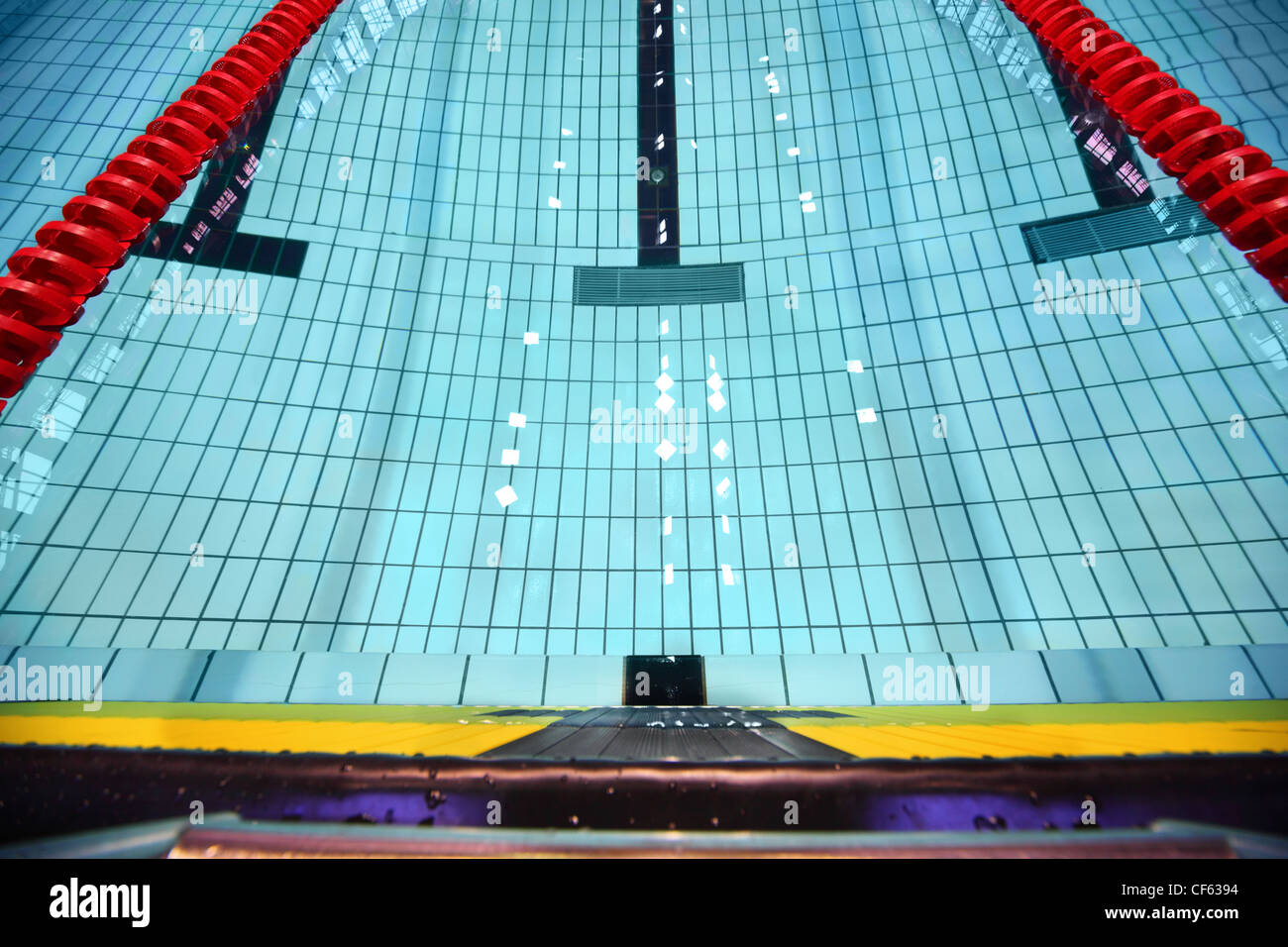 Bottom of swimming pool of paved blue tile Stock Photo - Alamy