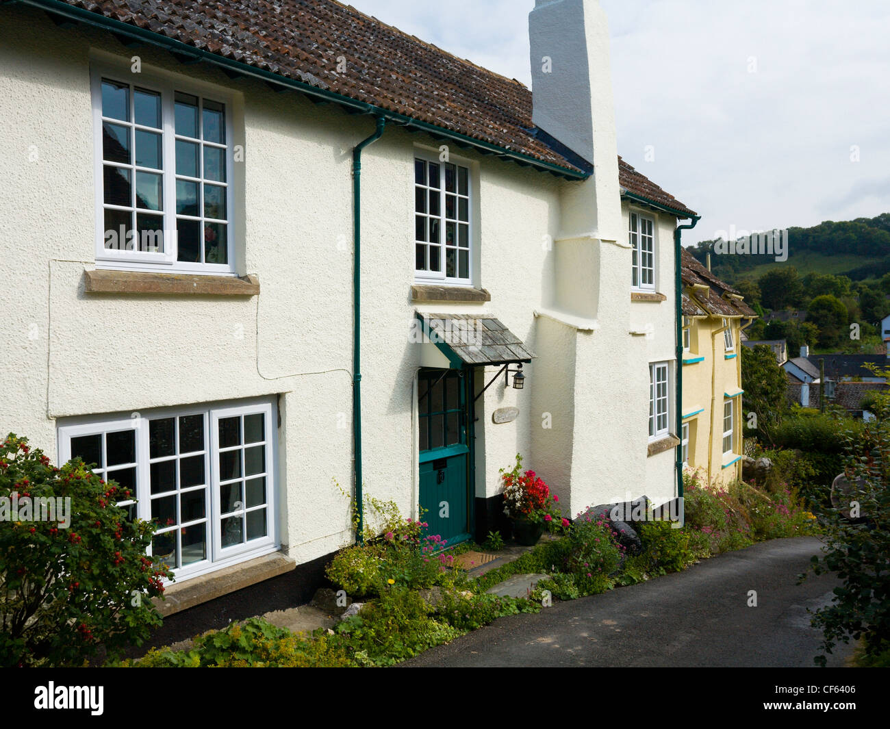 Pretty Cottage by a small lane in Winsford Stock Photo - Alamy
